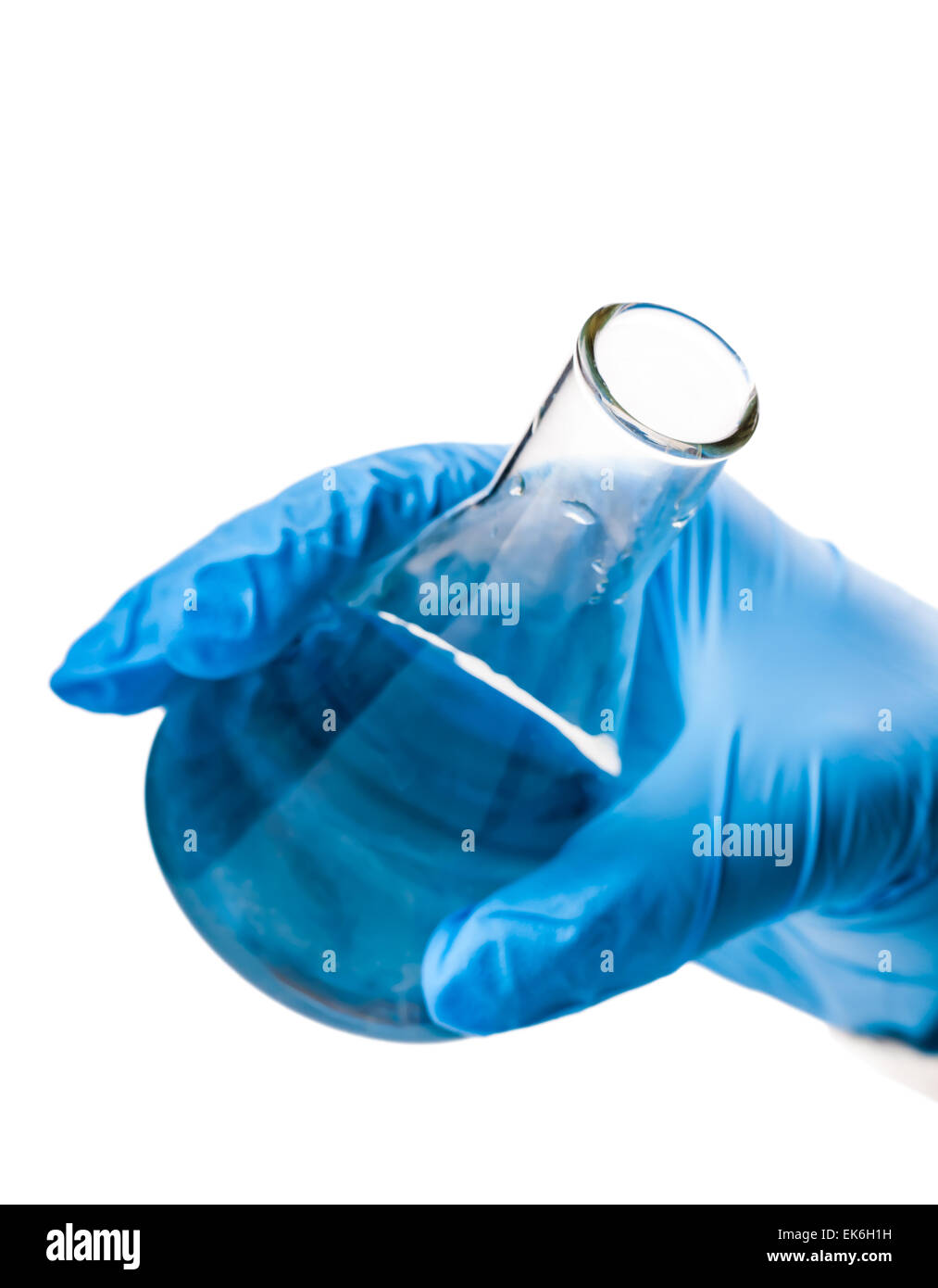 glass flask in hand on white background isolated Stock Photo - Alamy