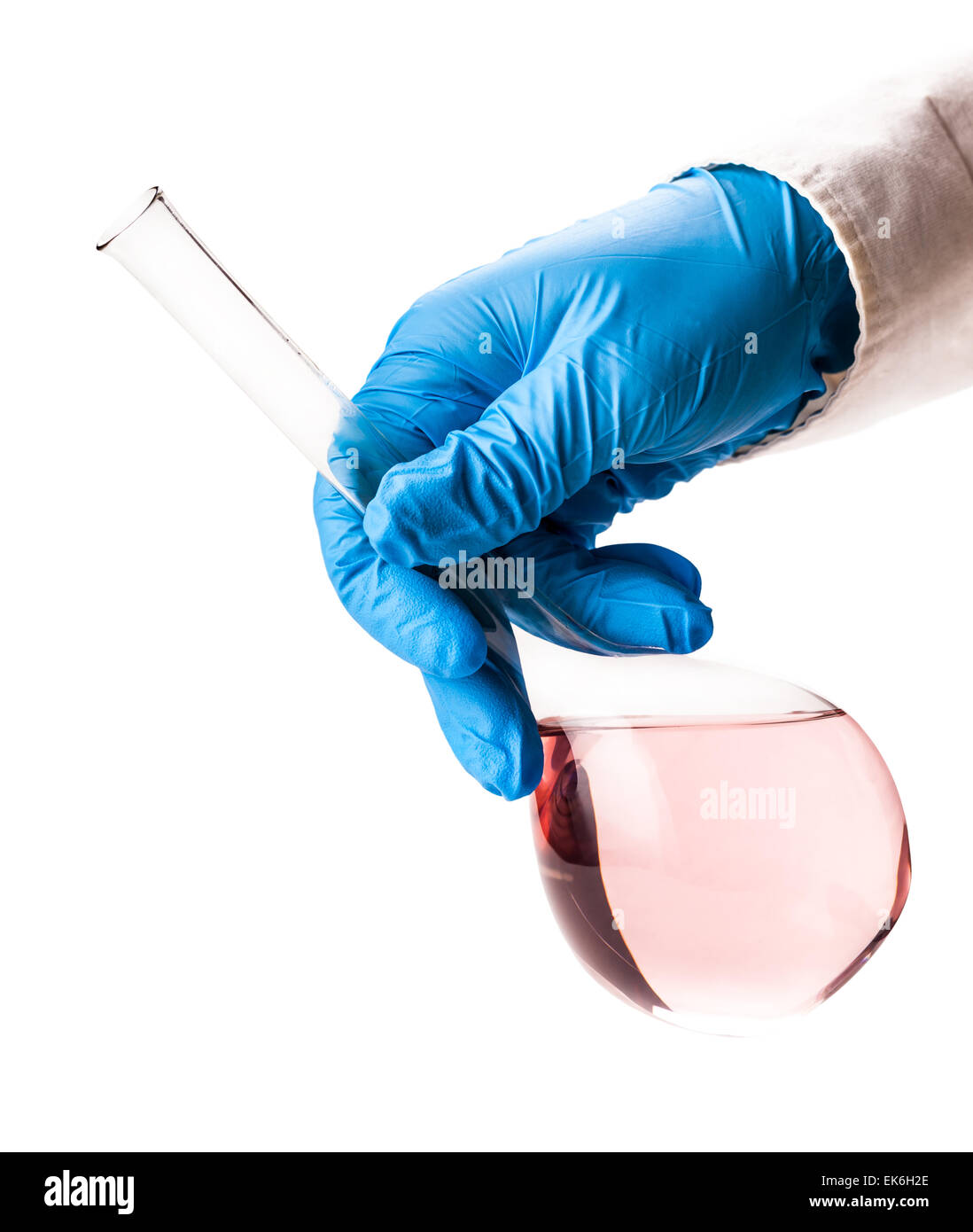glass flask in hand on white isolated background Stock Photo - Alamy