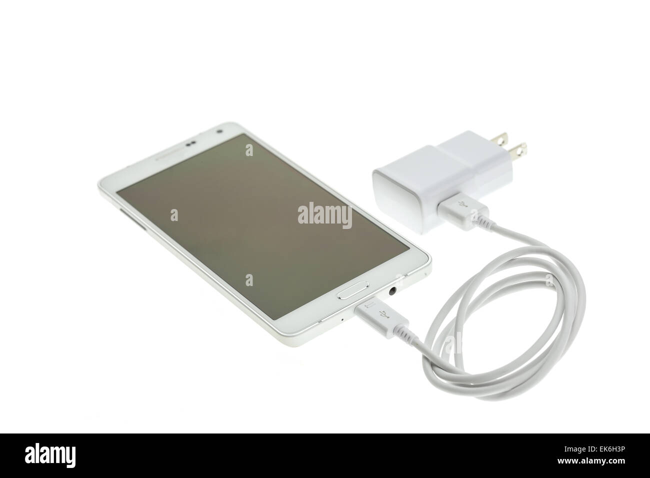 Macro Smartphone connect with charger isolated on white background ...