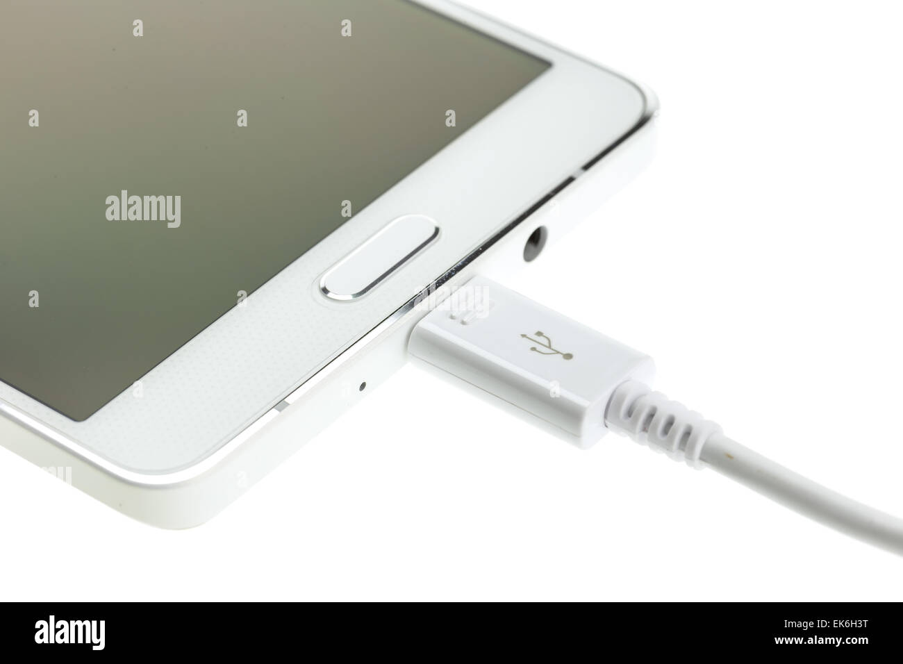 Macro Smartphone connect with charger isolated on white background ...