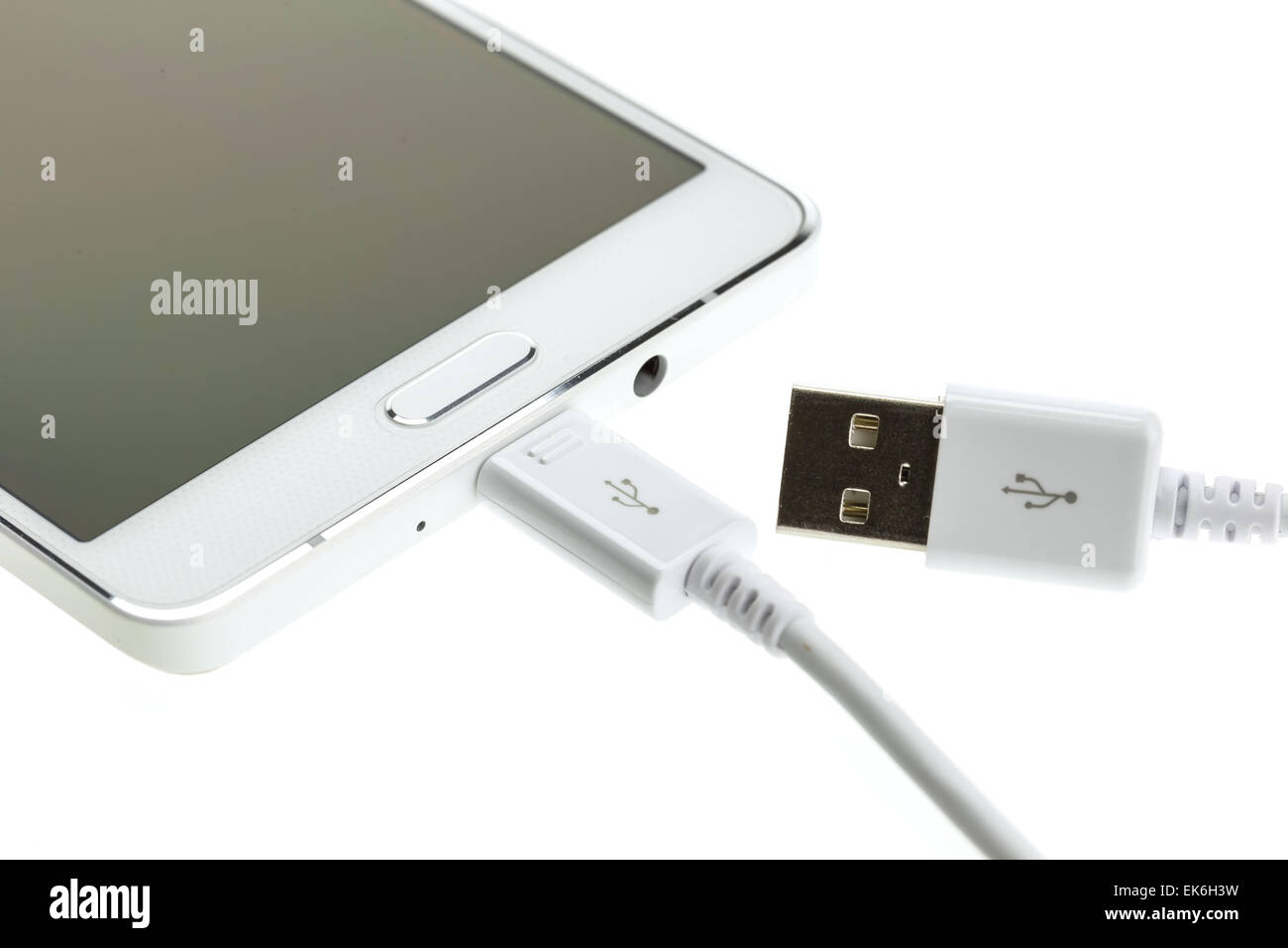 Macro Smartphone connect with charger isolated on white background ...