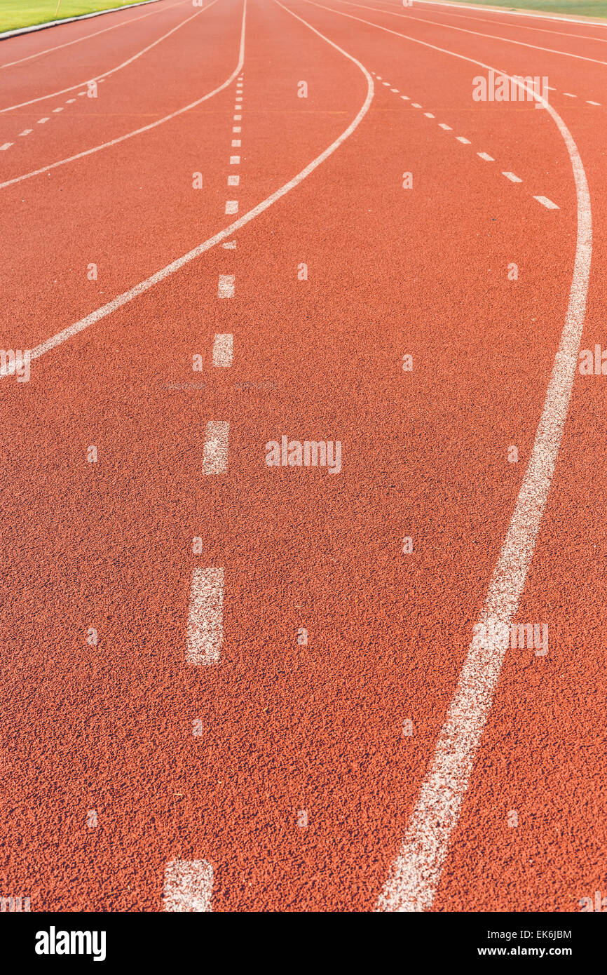 Running track with white stripe for athletics Stock Photo - Alamy
