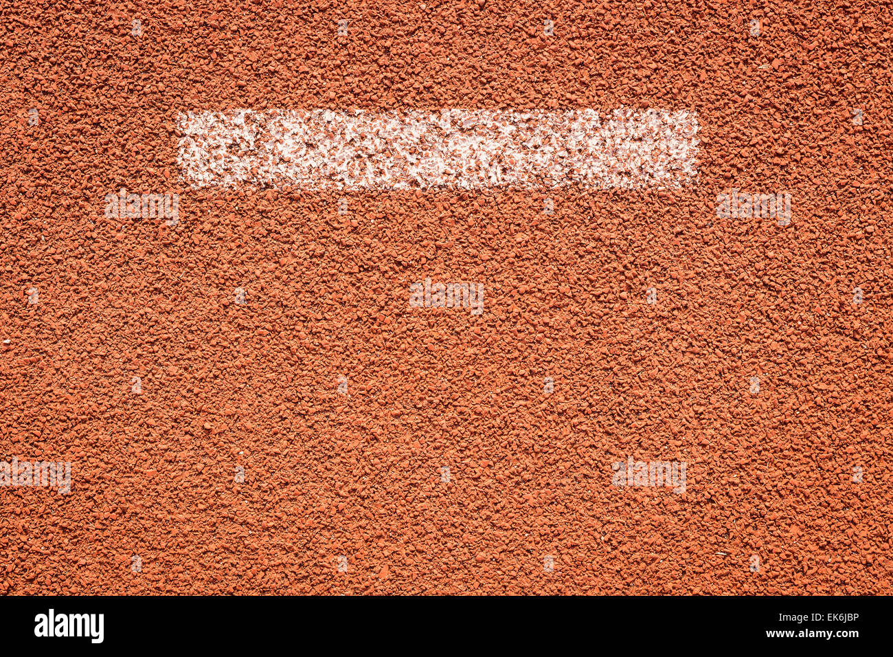 Running track with white stripe for athletics Stock Photo - Alamy