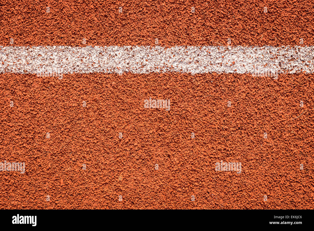Running track with white stripe for athletics Stock Photo - Alamy