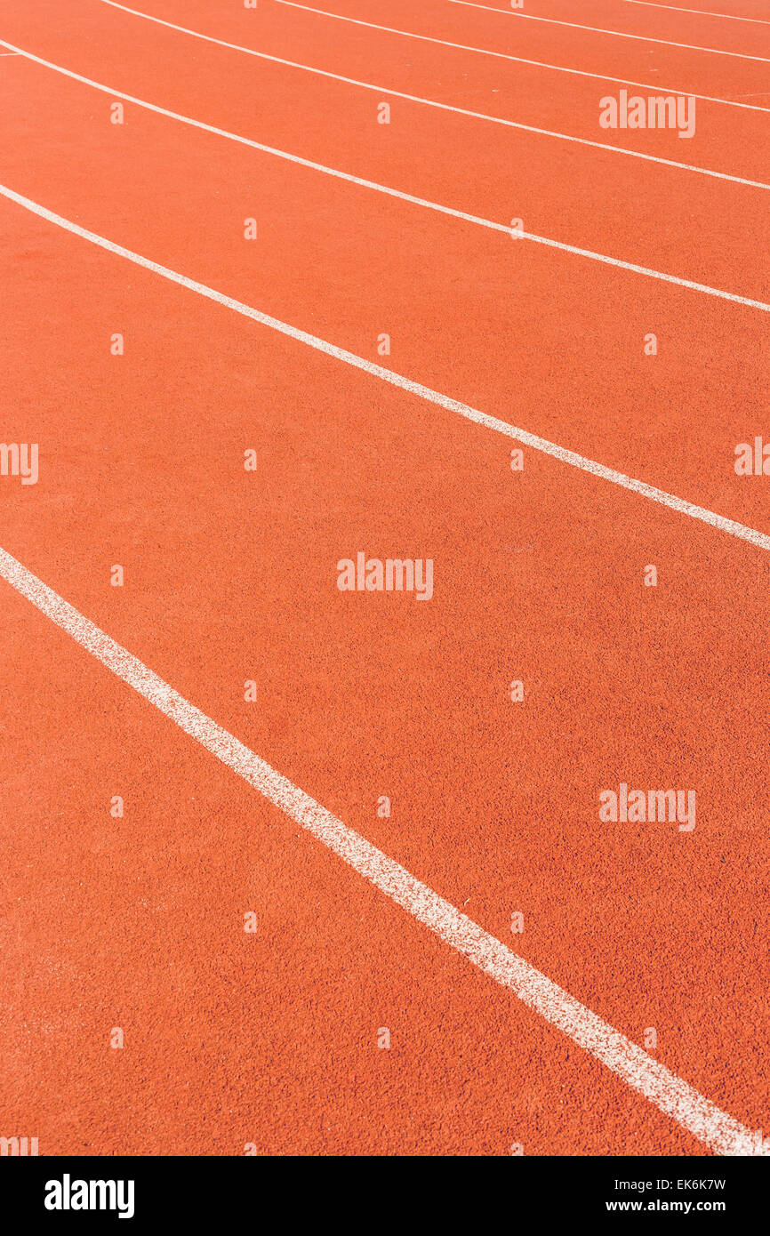 Running track with white stripe for athletics Stock Photo - Alamy