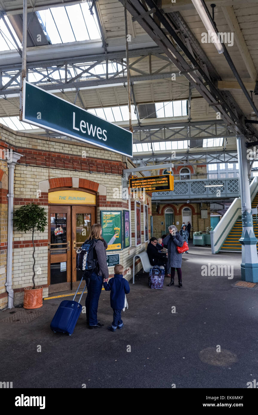 Passengers at the Lewes railway station, Lewes East Sussex England ...