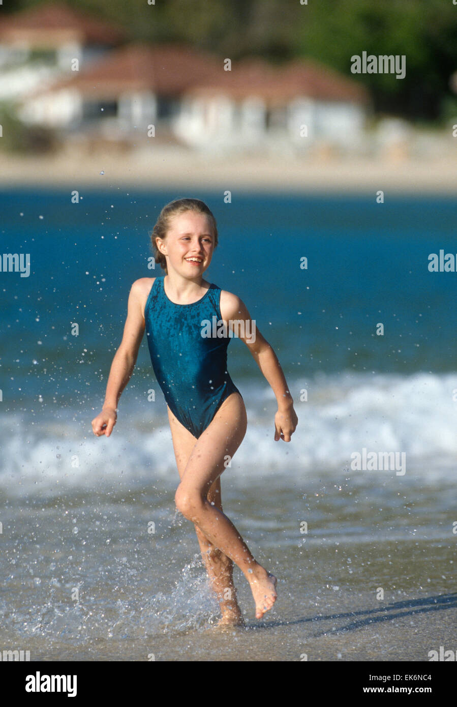 Girl running in sea water hi-res stock photography and images - Alamy