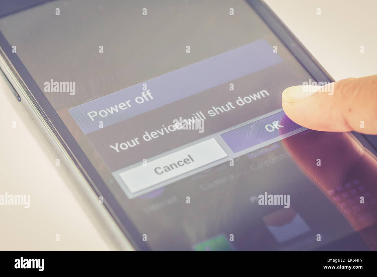 Close up finger press power off button on smartphone Stock Photo - Alamy