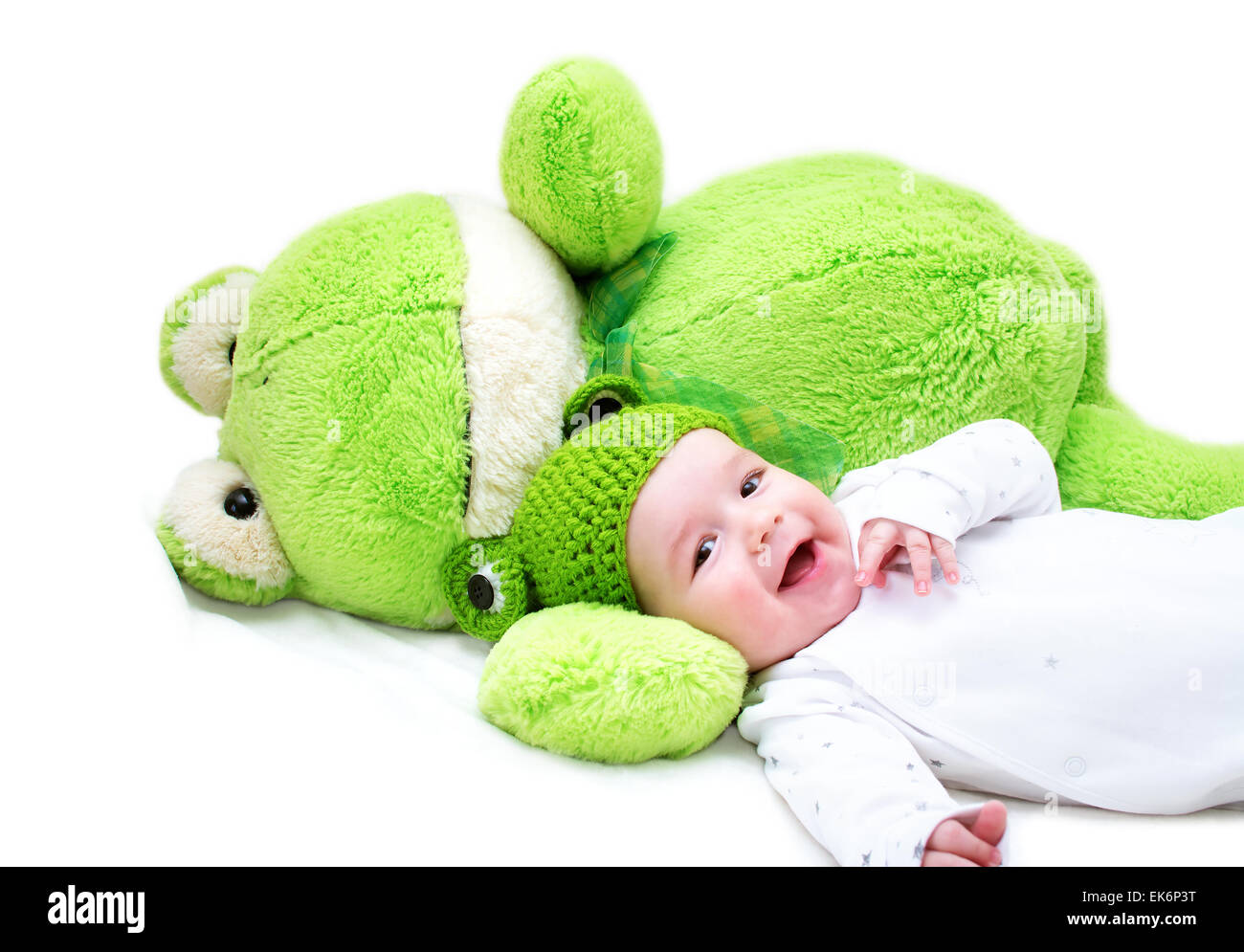 baby and frog toy Stock Photo - Alamy