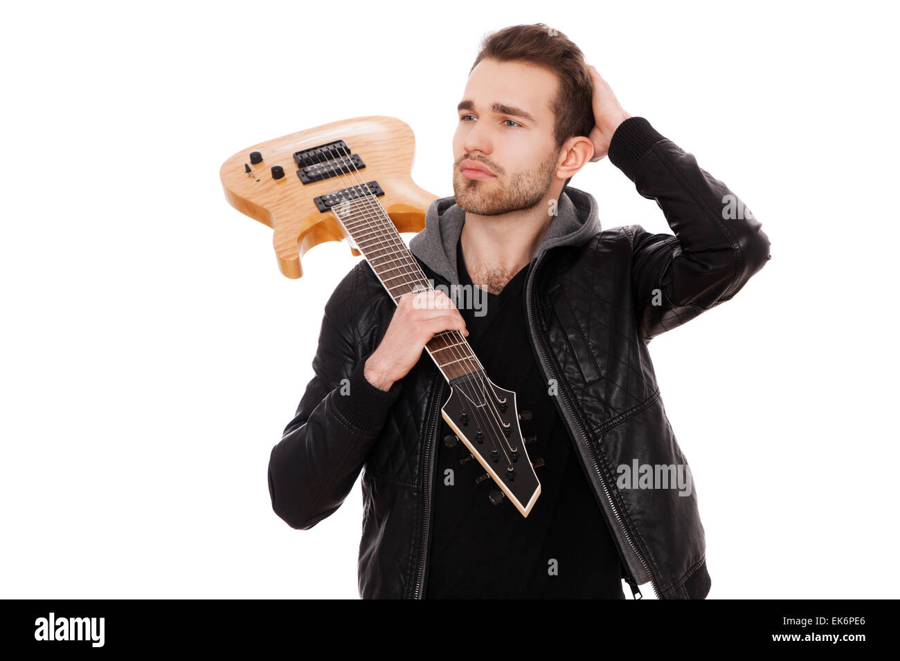 Handsome young man with an electric guitar Stock Photo - Alamy