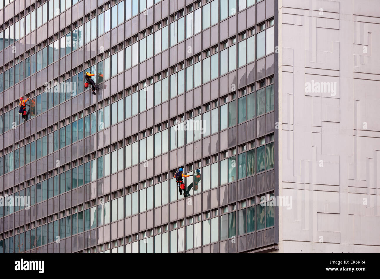 Manchester City Tower office block window cleaning team Stock Photo - Alamy