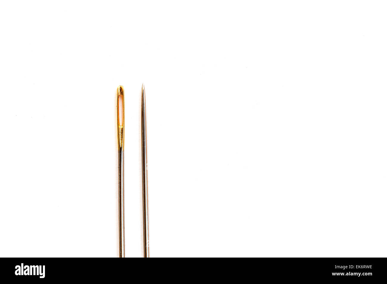 Close up sewing needle on white background Stock Photo - Alamy