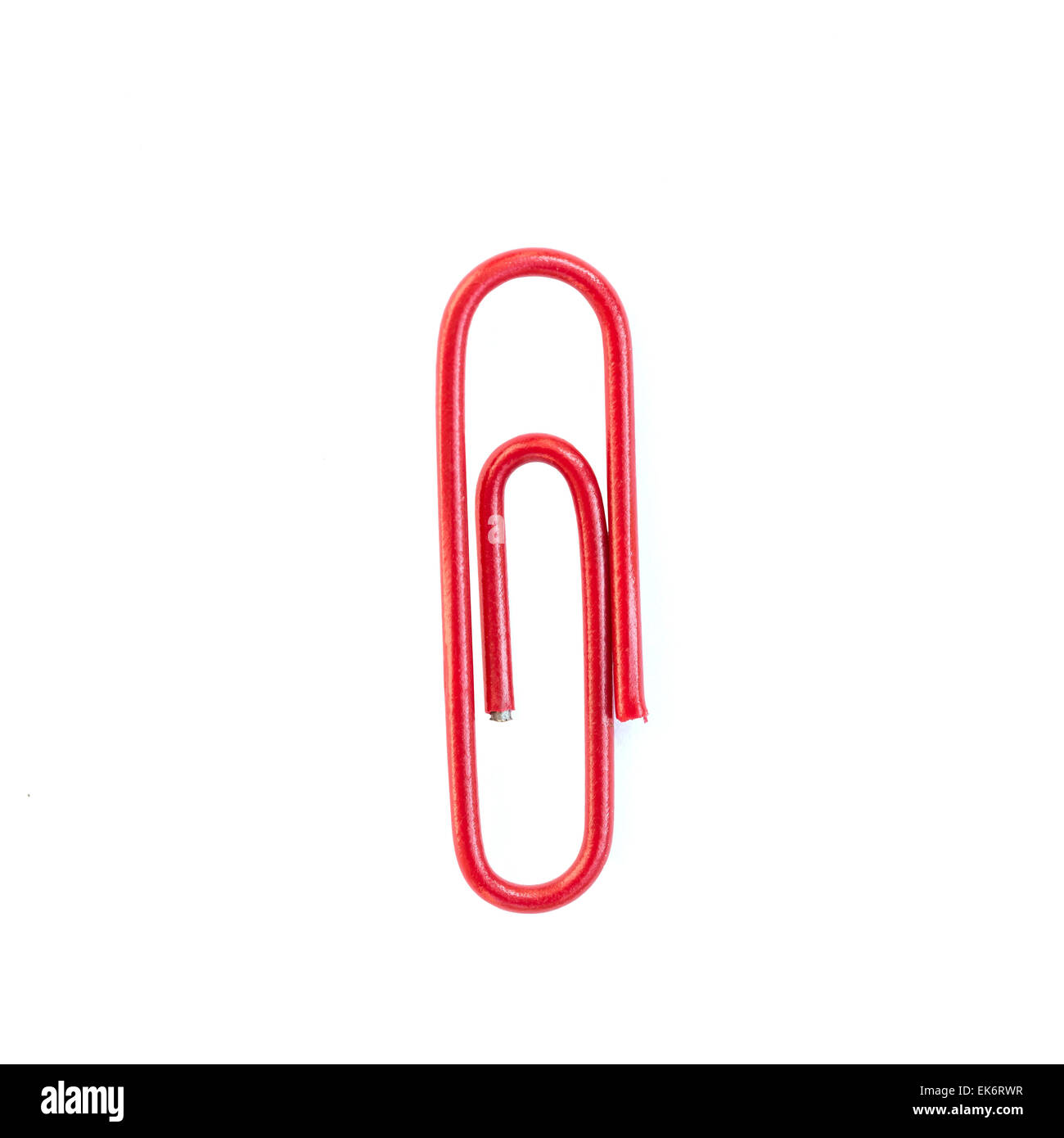 Red paper clip isolated on white background Stock Photo - Alamy