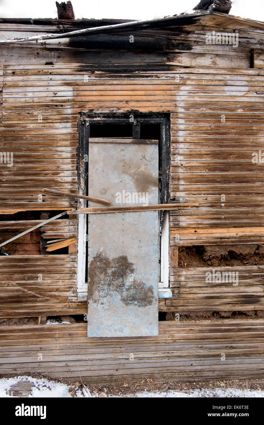 Old abandoned window, detail of a window of a house in ruins, evictions ...