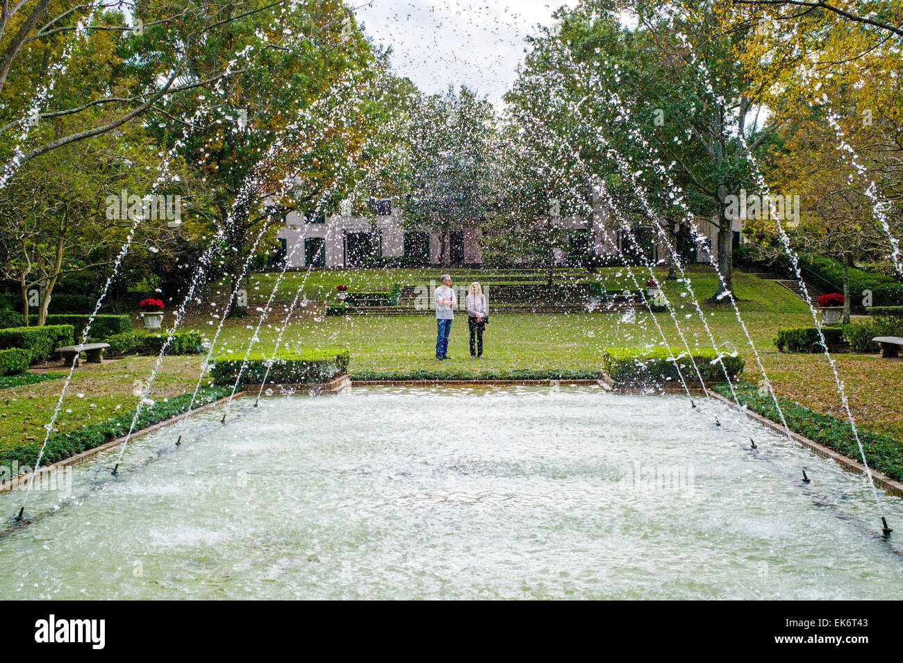 Tourists view fountains, Bayou Bend gardens & home, Museum of Fine Arts ...