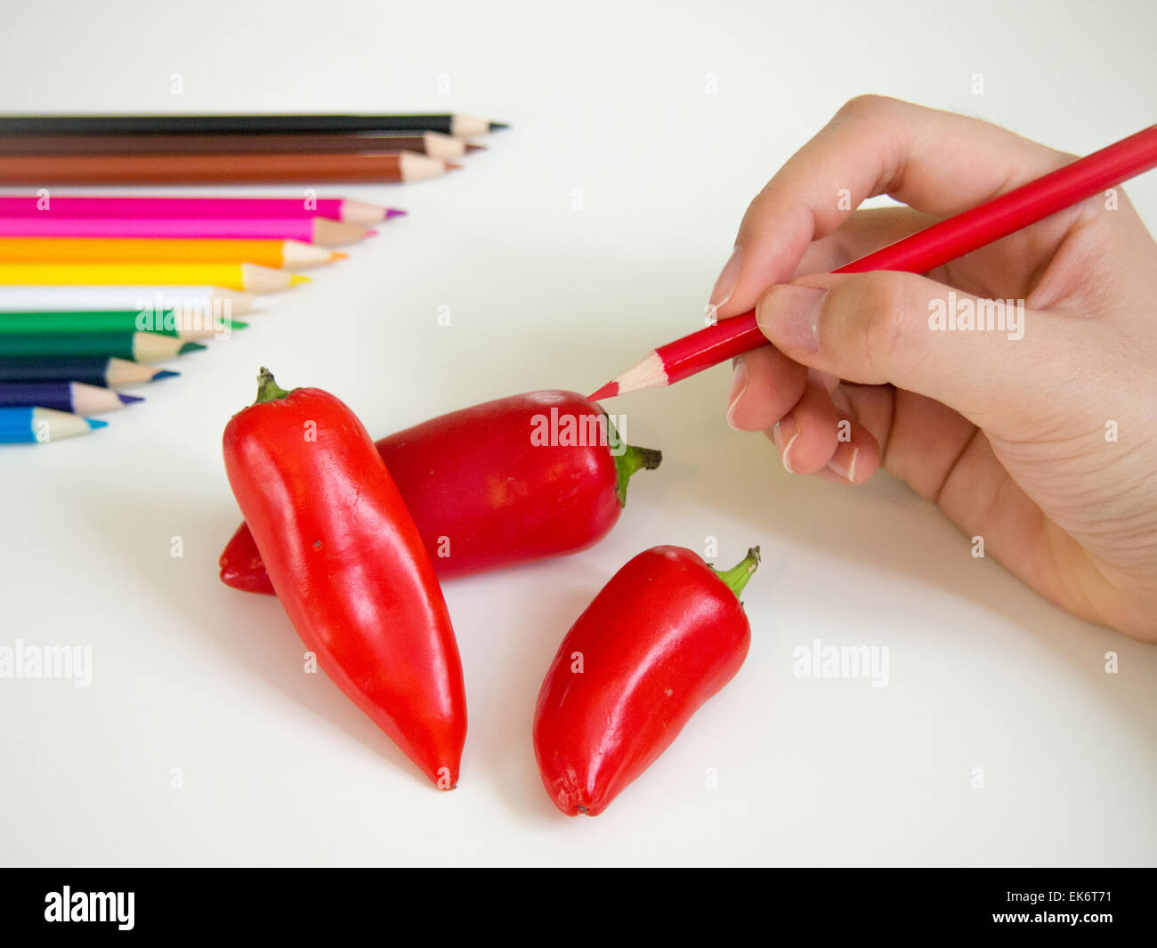 looks like drawing papricas with the colored pencil Stock Photo - Alamy