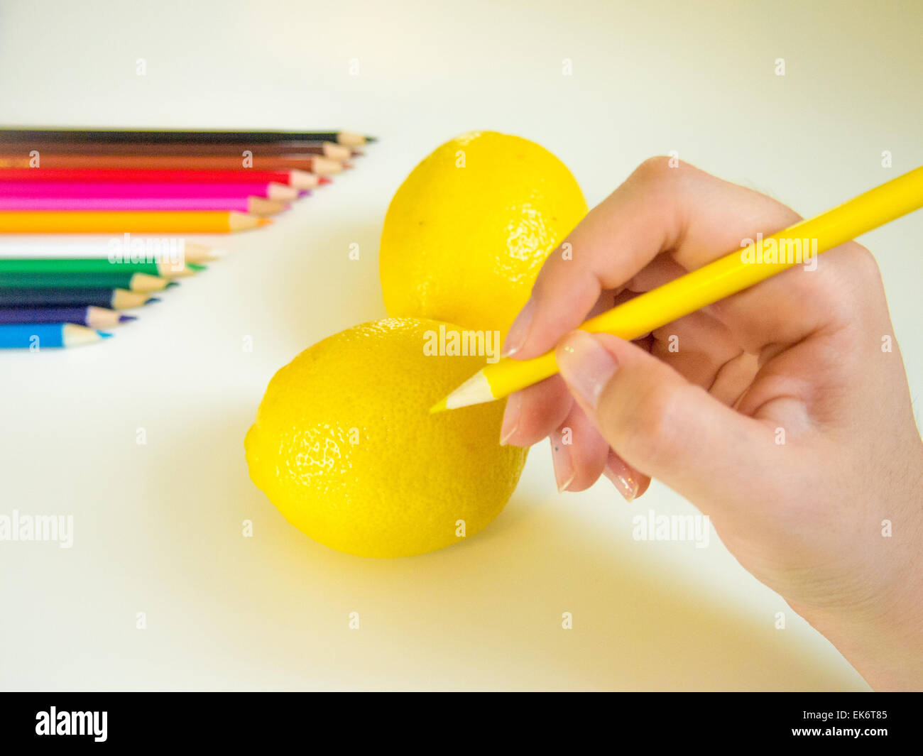 looks like drawing lemons with the colored pencil Stock Photo - Alamy
