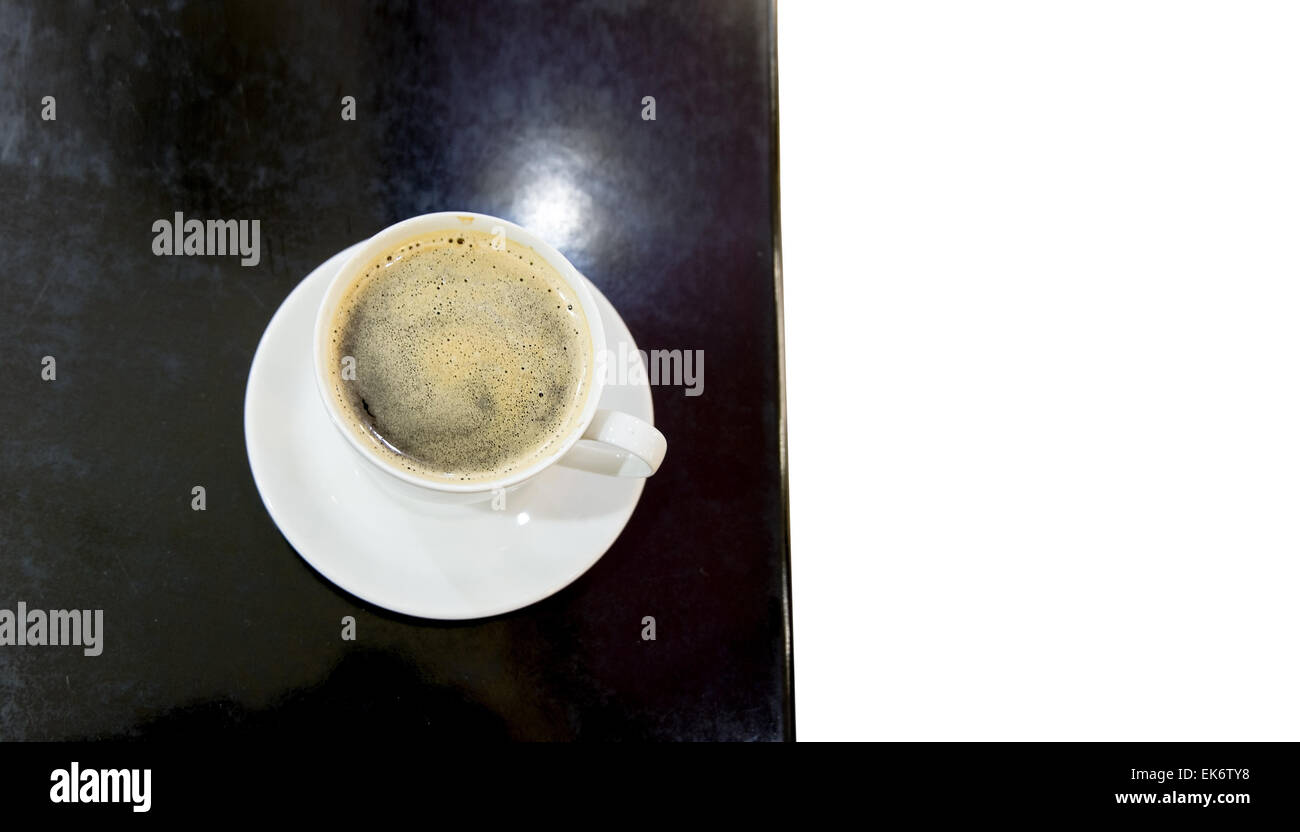 Cup of coffee on table from above view Stock Photo - Alamy