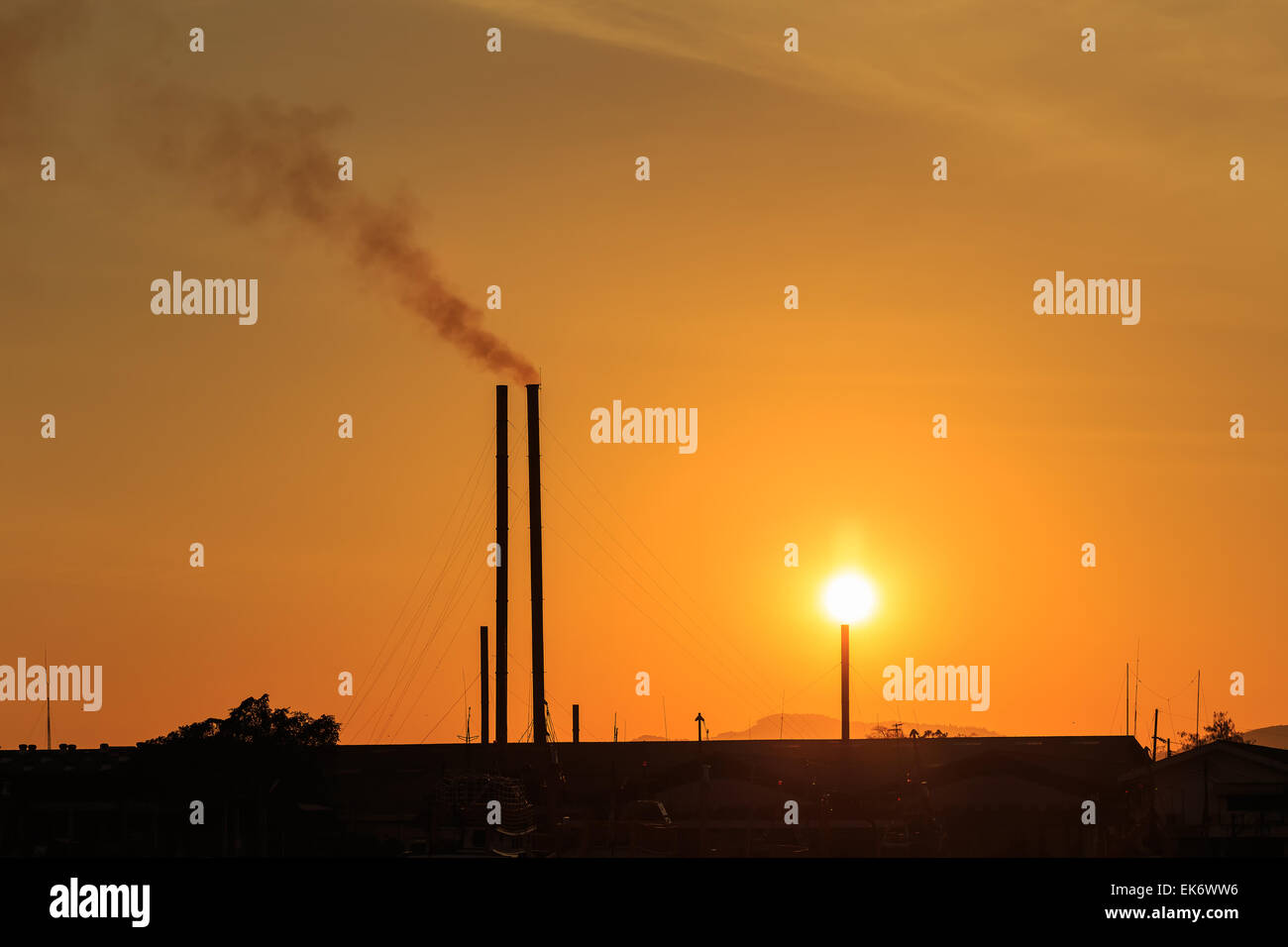 Factory silhouette pollution smokestacks hi-res stock photography and ...