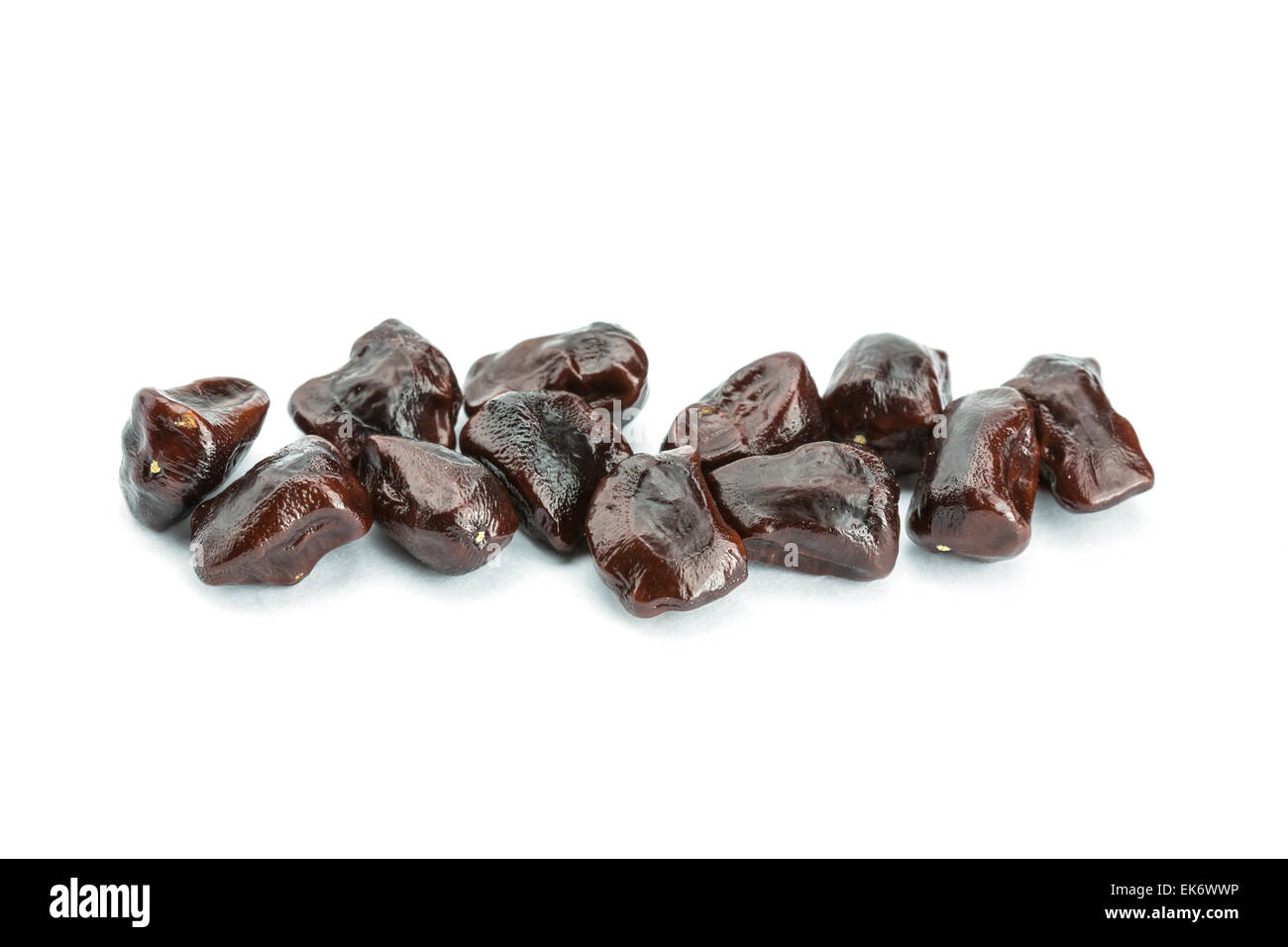 Close up seed of tamarind isolated on white background Stock Photo - Alamy