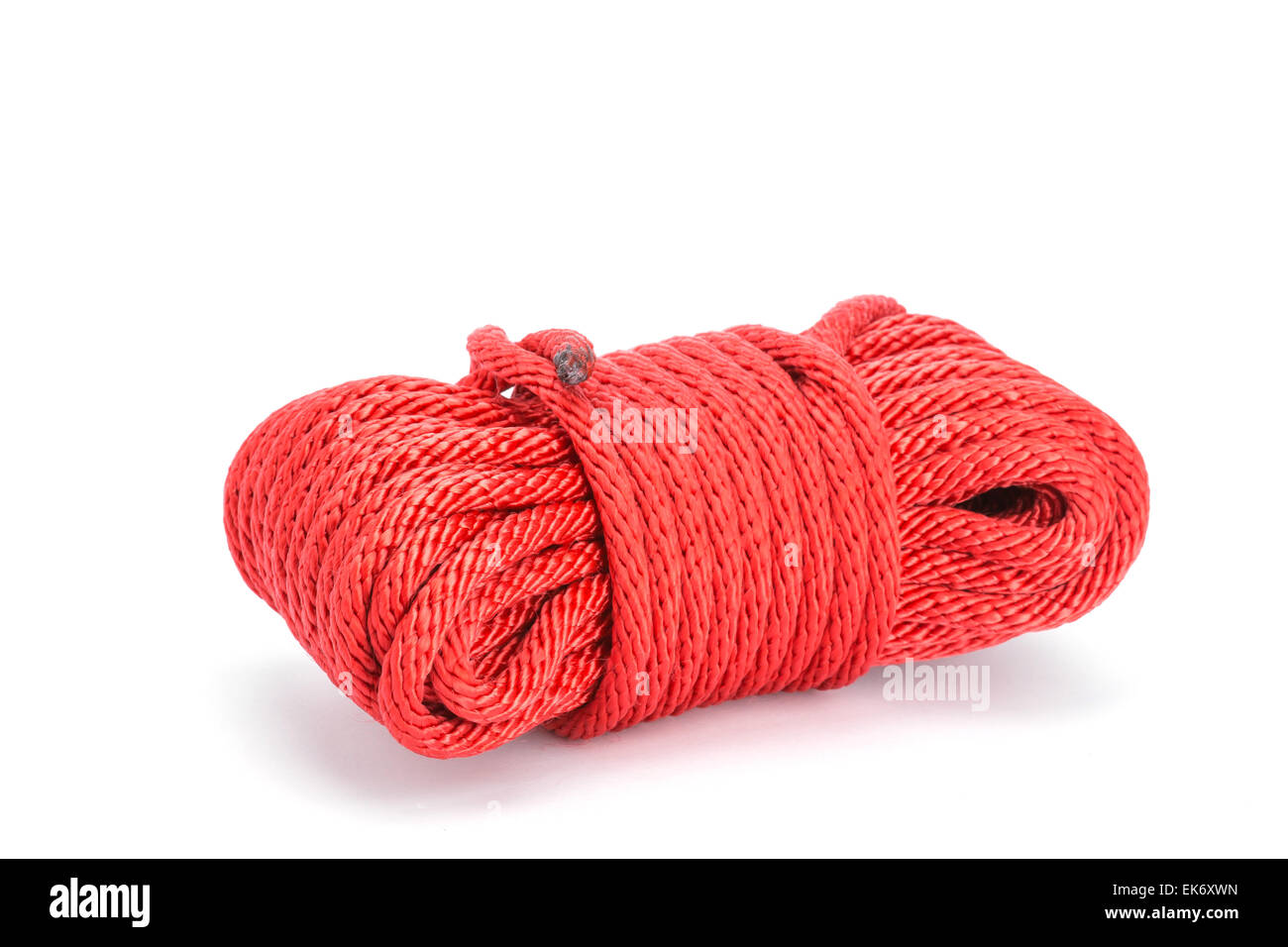 Red rope isolated on white background Stock Photo - Alamy