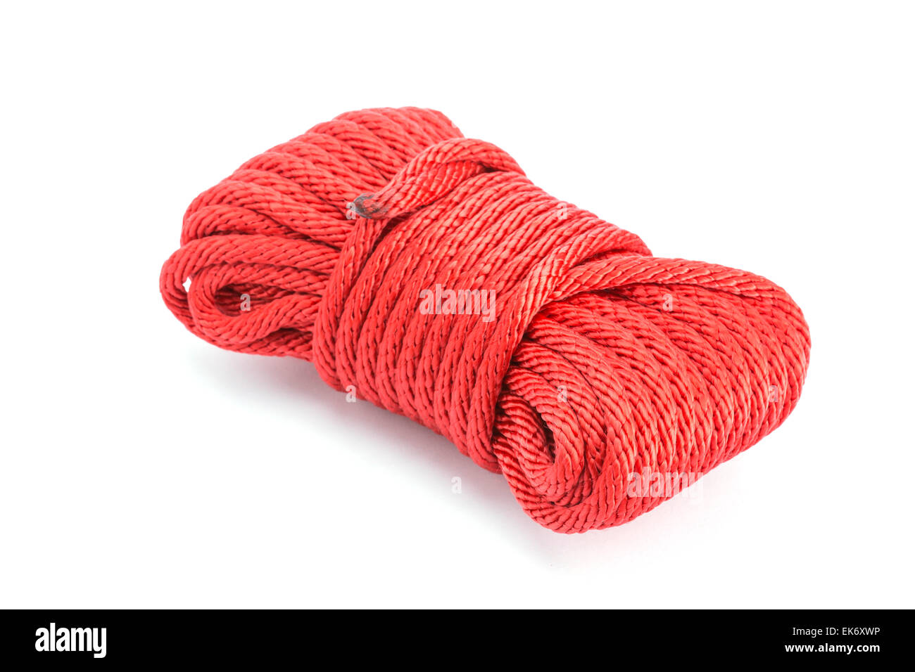Red rope isolated on white background Stock Photo - Alamy