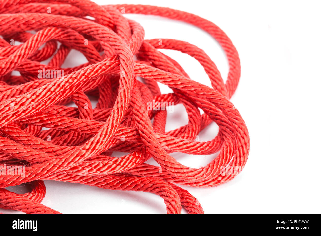 Red rope isolated on white background Stock Photo - Alamy