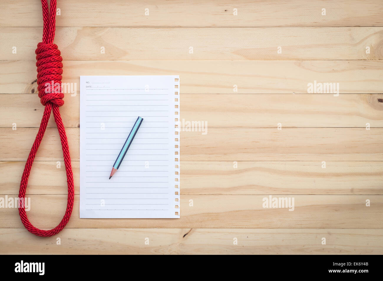 Rope with knotted and paper note on wooden background Stock Photo - Alamy