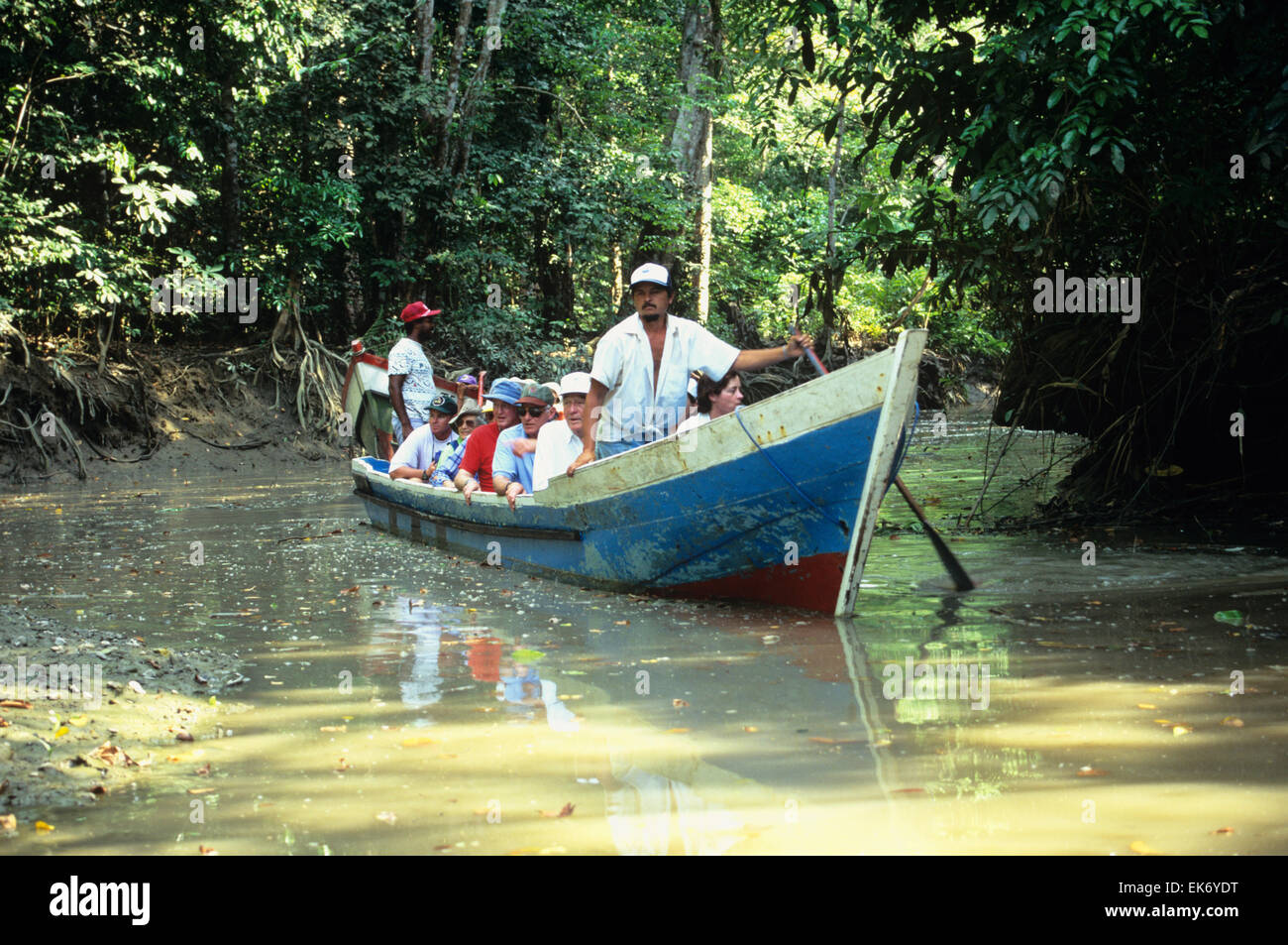 Local boatmen guide their Cuyucos to a landing spot at Choco Indian ...
