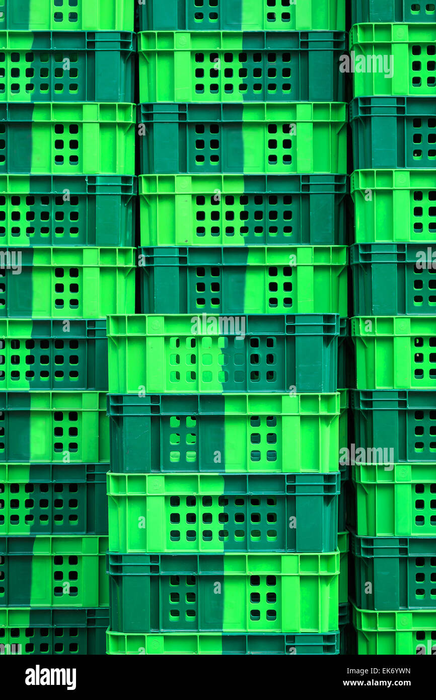 Stack of empty green crate Stock Photo - Alamy