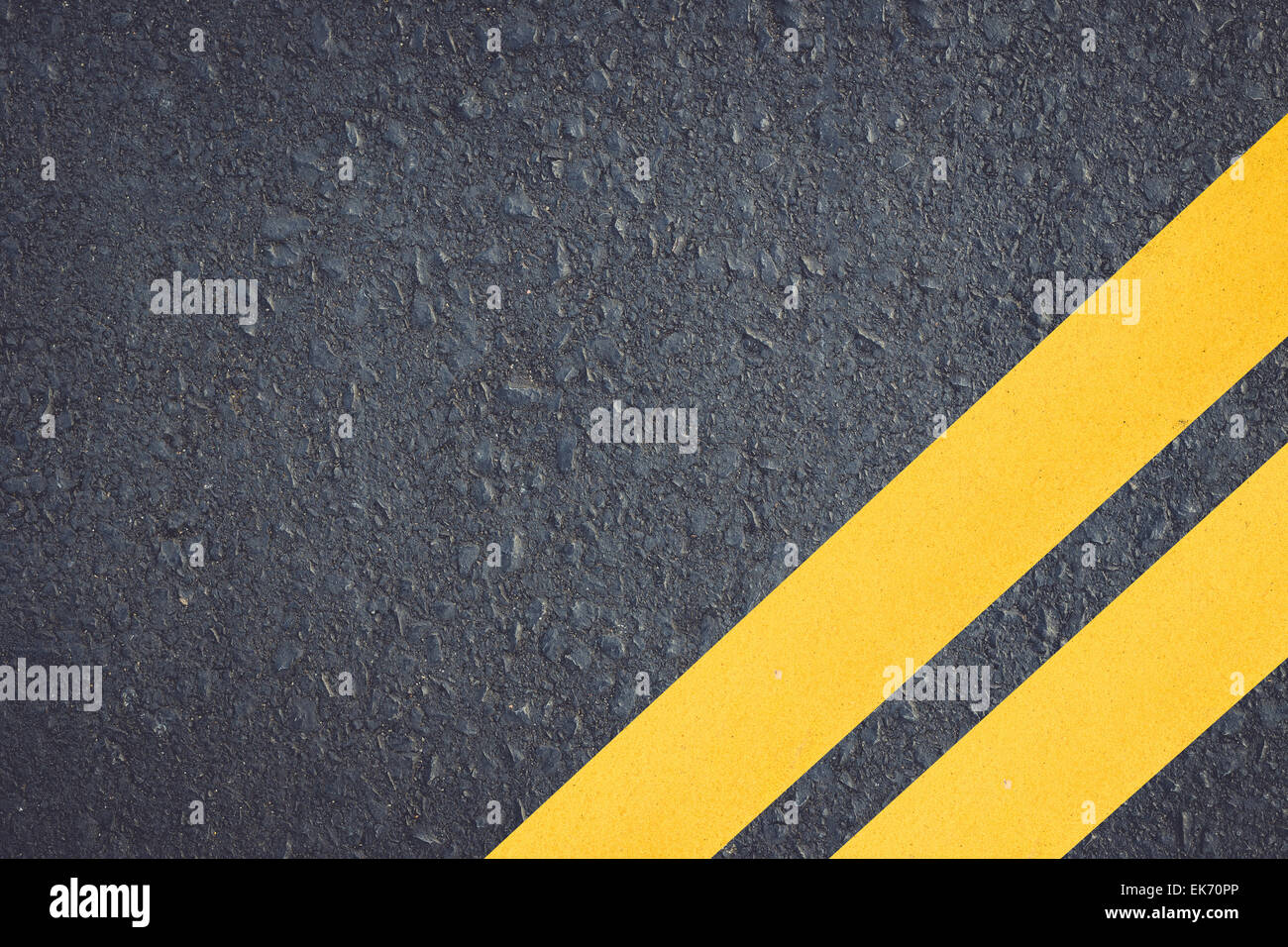 Asphalt road texture with yellow stripe Stock Photo - Alamy