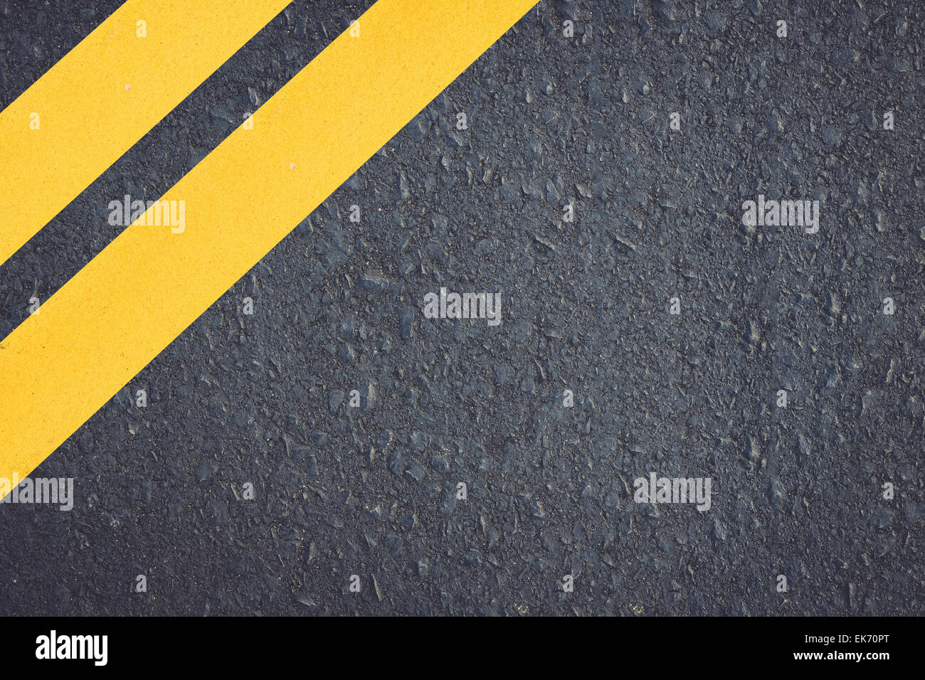 Asphalt road texture with yellow stripe Stock Photo - Alamy