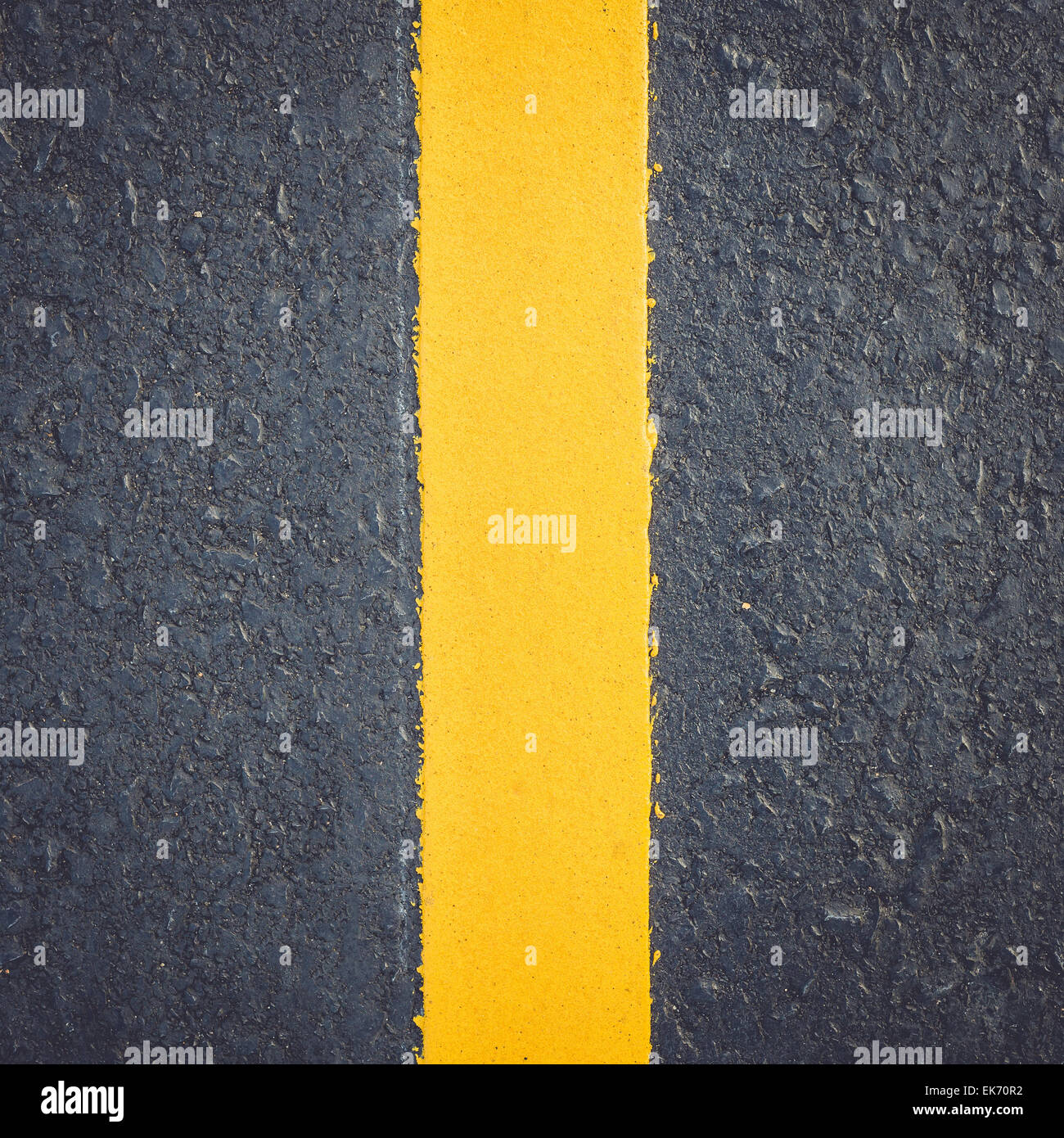 Asphalt road texture with yellow stripe Stock Photo - Alamy