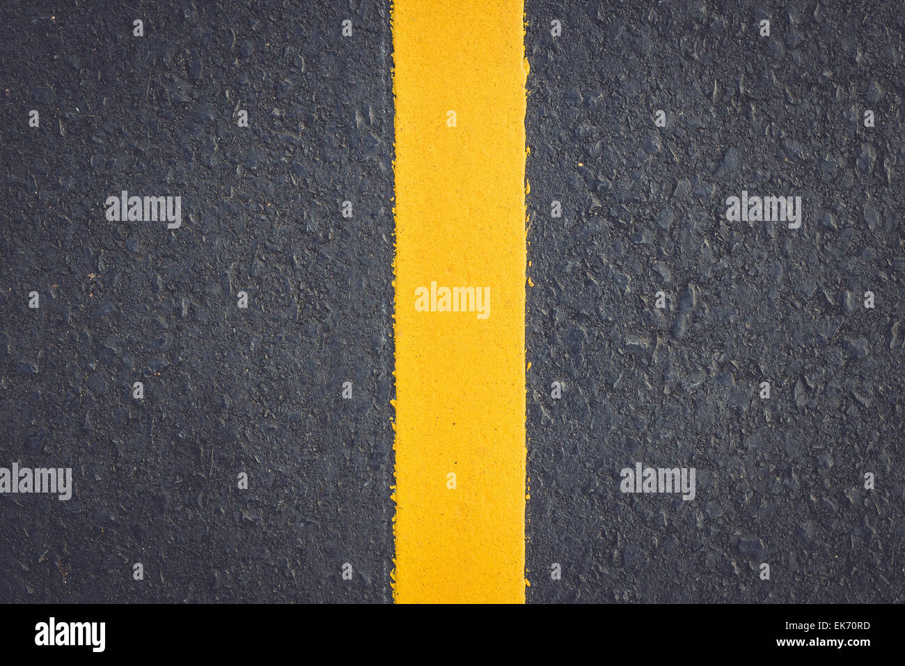 Asphalt road texture with yellow stripe Stock Photo - Alamy