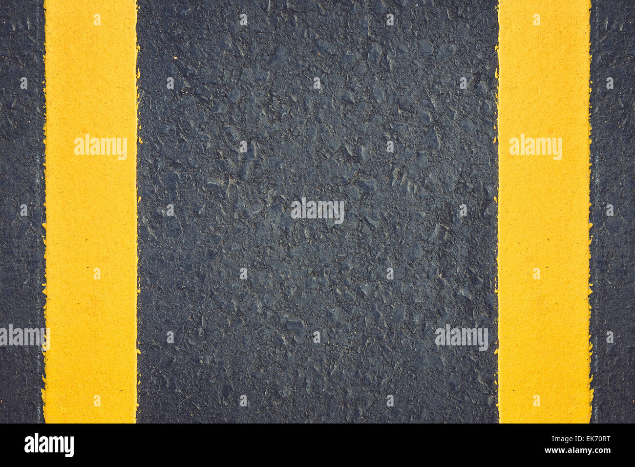 Asphalt road texture with yellow stripe Stock Photo - Alamy