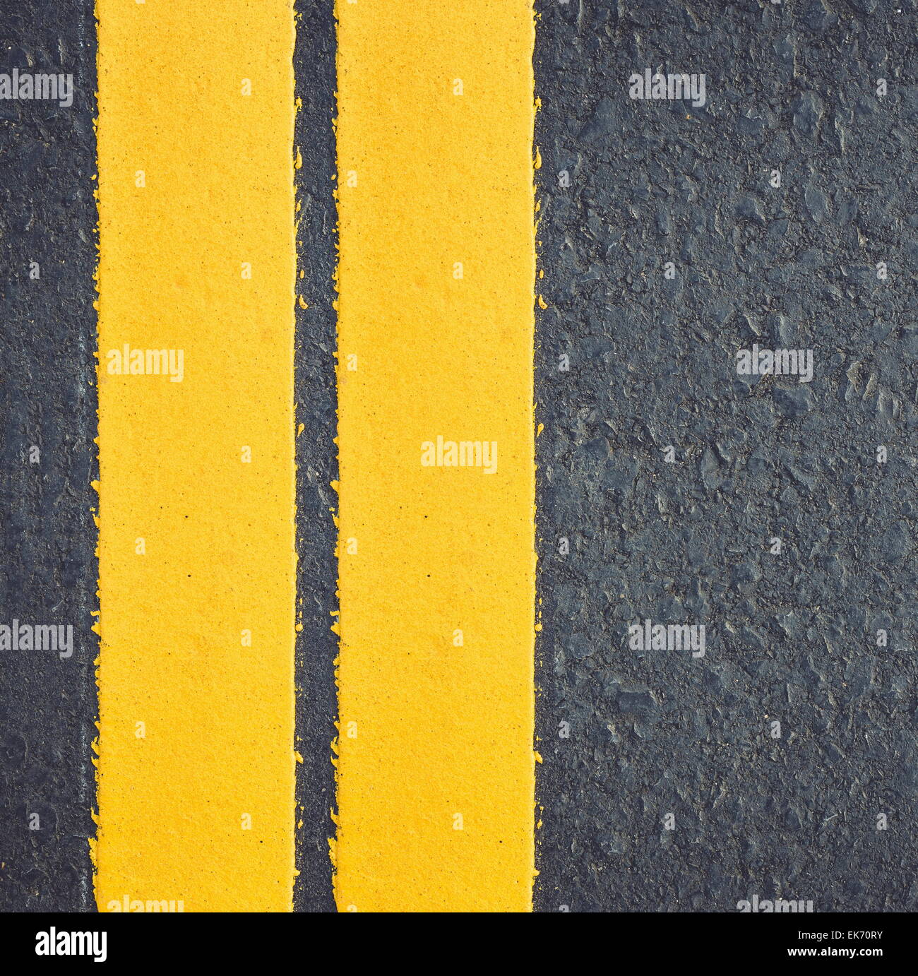 Asphalt road texture with yellow stripe Stock Photo - Alamy