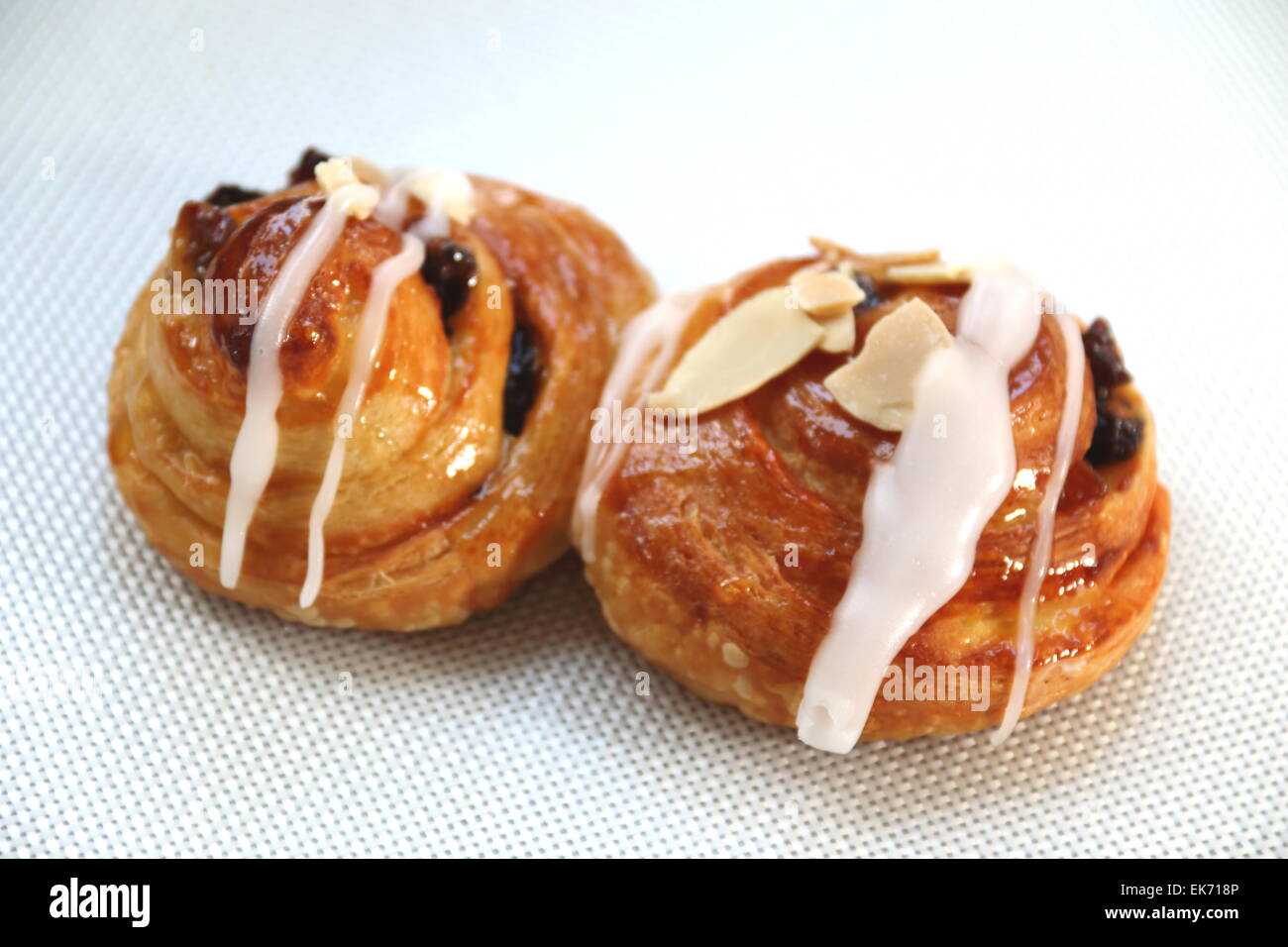 Raisin cream roll danish and almond slice Stock Photo - Alamy