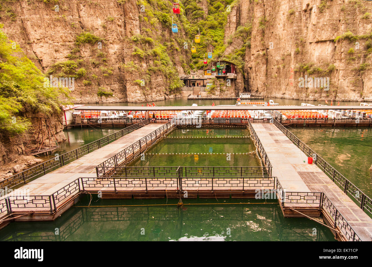 BEIJING,CHINA-MAY 24,2013: Cable car and boats in Long Qing Xia Stock ...