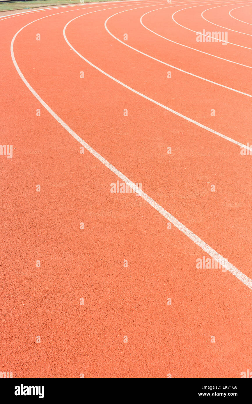 Running track with white stripe for athletics Stock Photo - Alamy