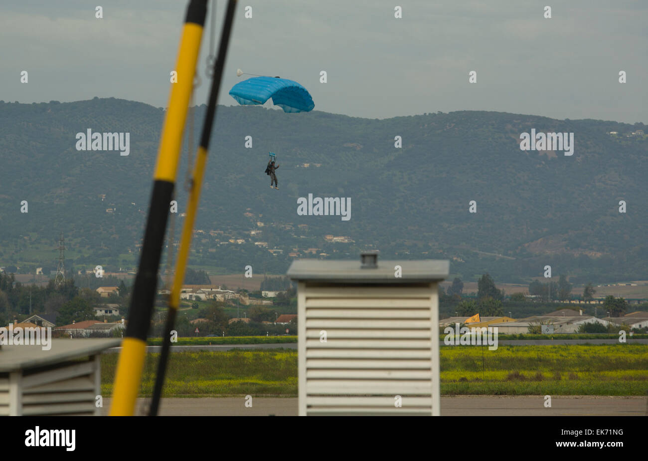 A skydiver performing skydiving with blue sky in the background Stock ...