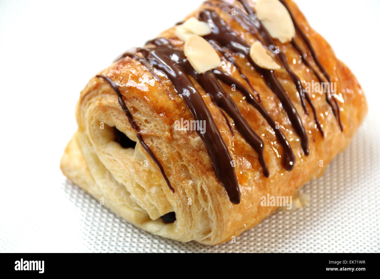 A chocolate Danish on a white background Stock Photo - Alamy