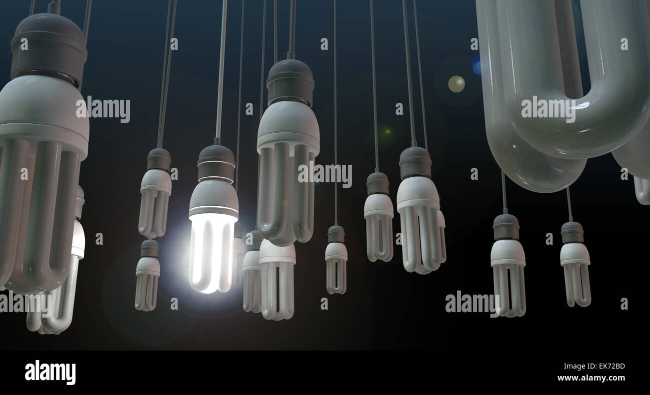A concept image showing unlit dangling flourescent light bulbs with one ...