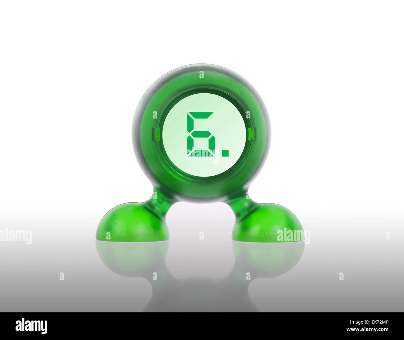 Small green plastic object with a digital display, displaying 6 Stock ...