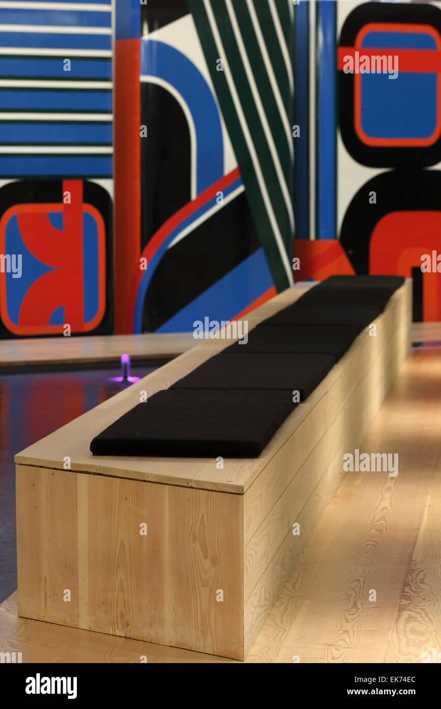 Timber bench with paint bottling tanks in background. IBC Innovation ...