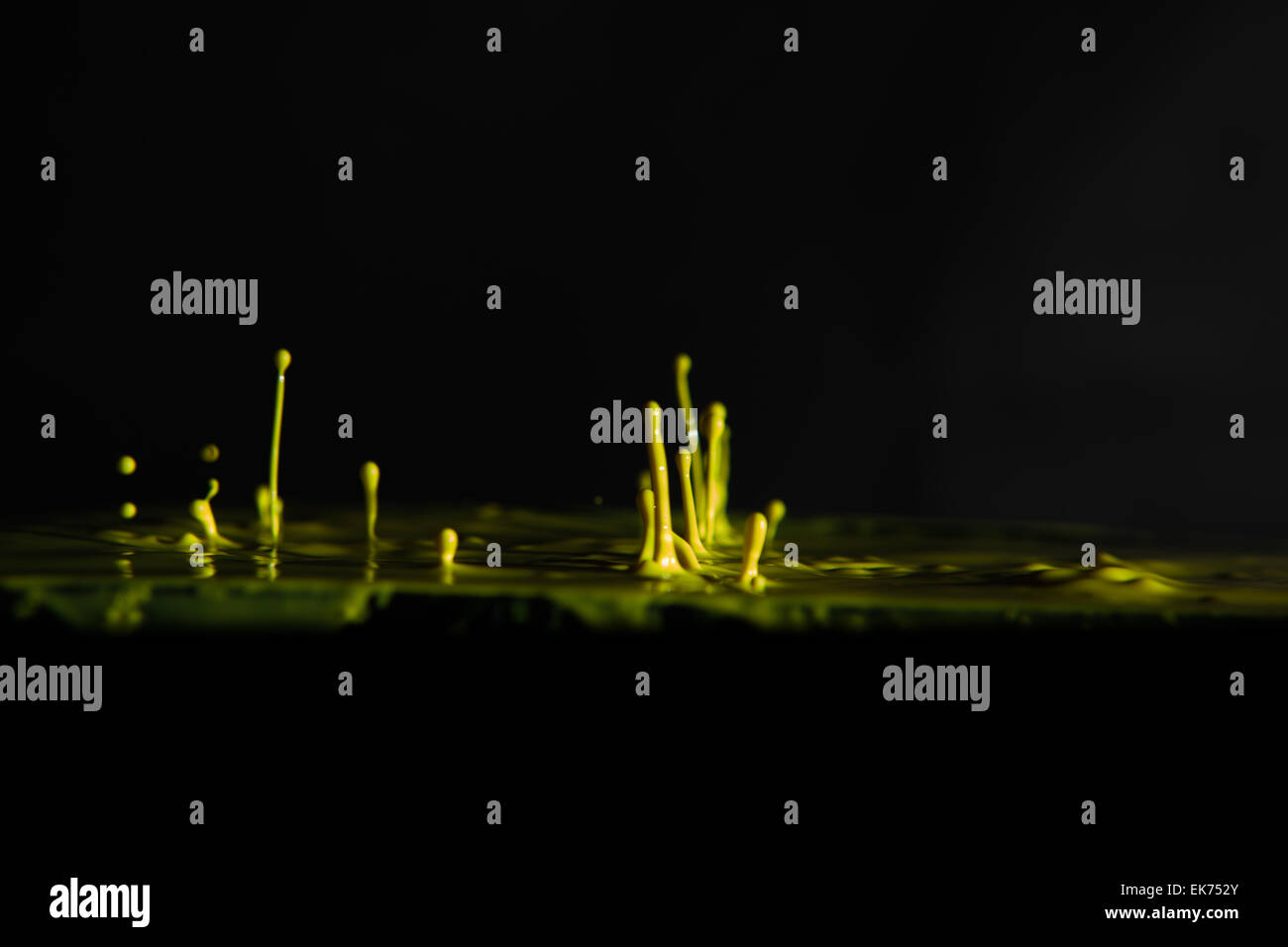 yellow paint splashes Stock Photo - Alamy