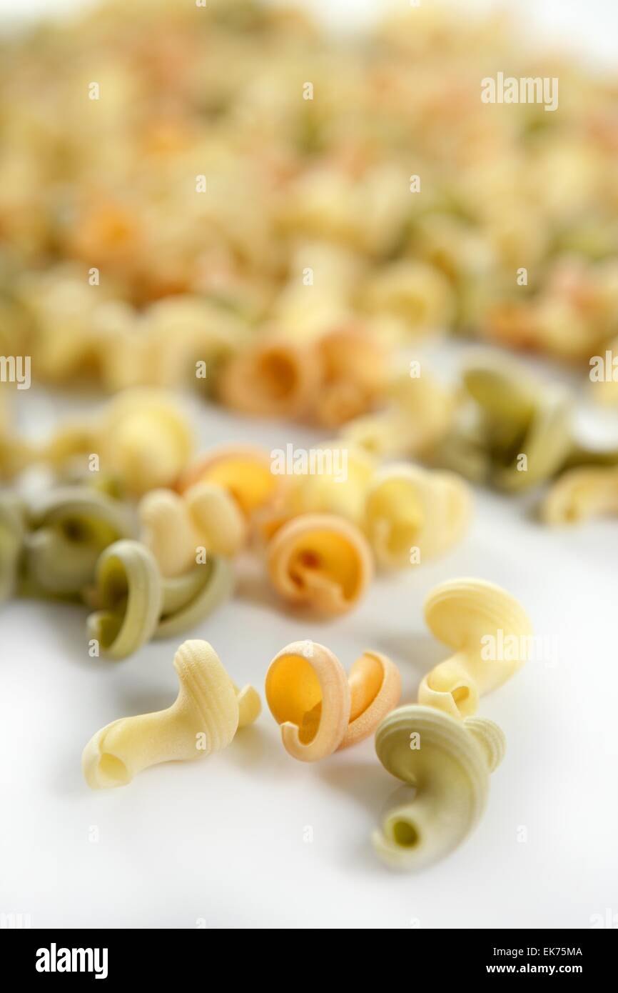 Snail shape Italian pasta texture Stock Photo - Alamy