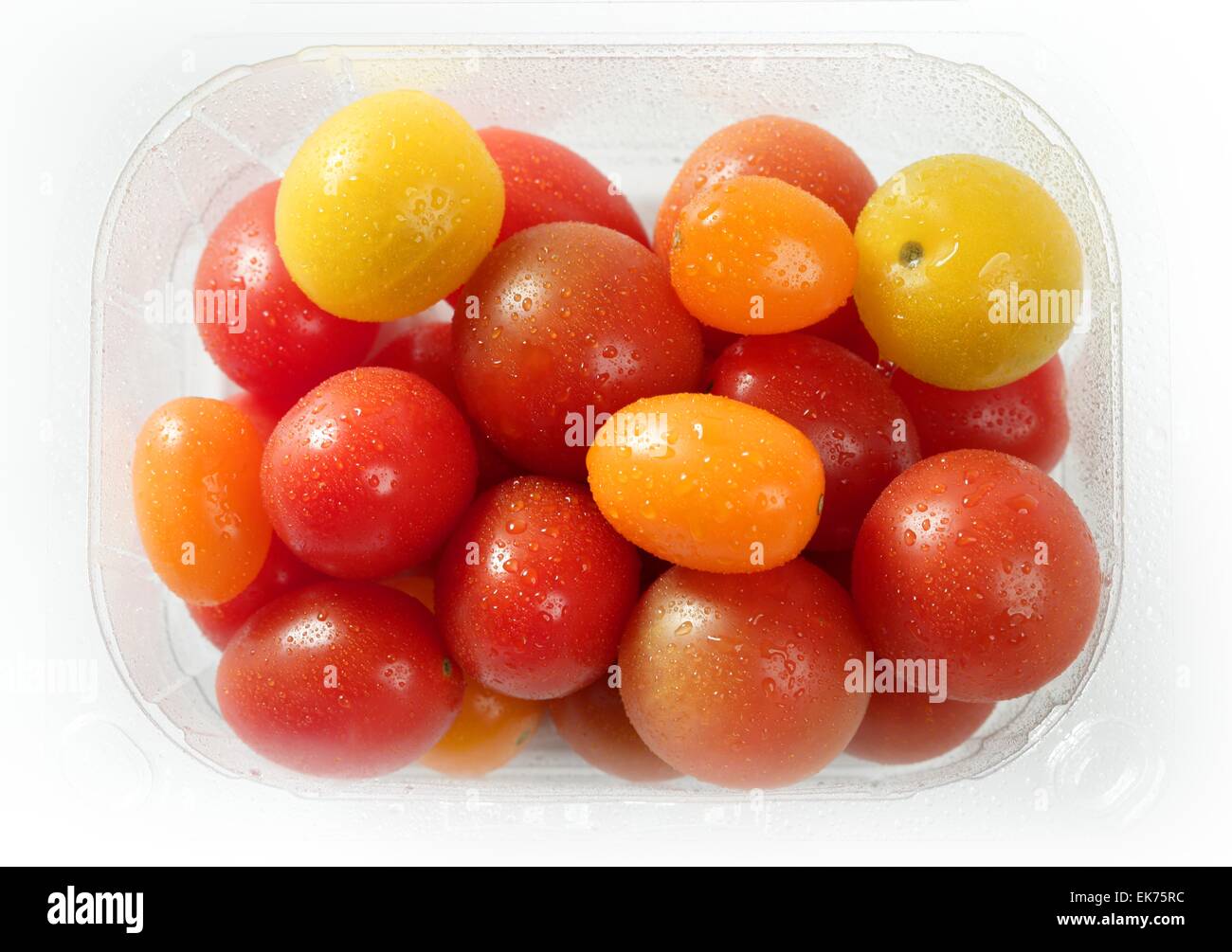 Little cherry varied multi color tomatoes Stock Photo - Alamy