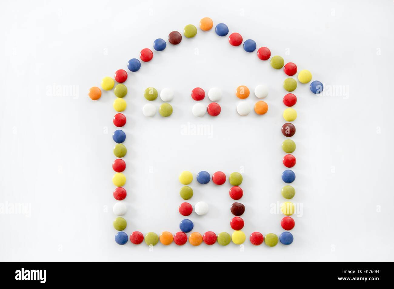 chocolate little candy sweets, house shape Stock Photo - Alamy
