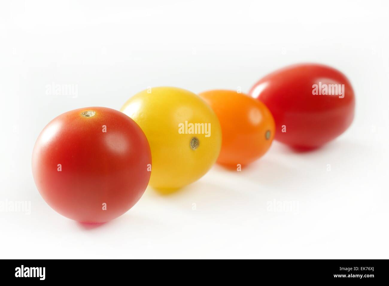 Little cherry varied multi color tomatoes Stock Photo - Alamy