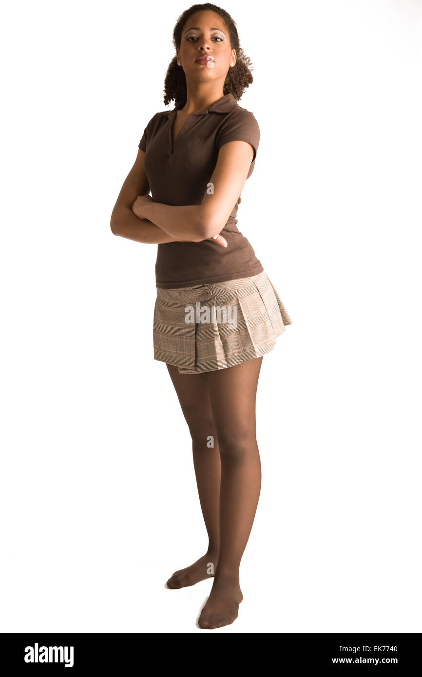 Standing with her arms crossed Stock Photo - Alamy